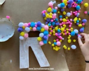 Get kids crafting with easy pom pom paper mache letters - La creative mama